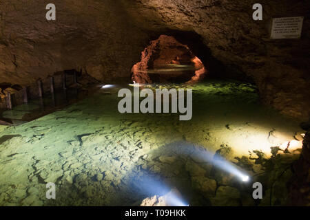 Inside Cave with water pool / pond & rock formation / formations ...