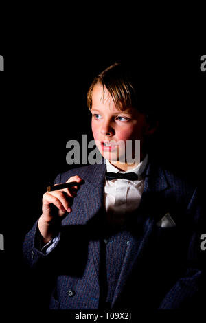 Little Boy Smoking a Cigar Stock Photo - Alamy