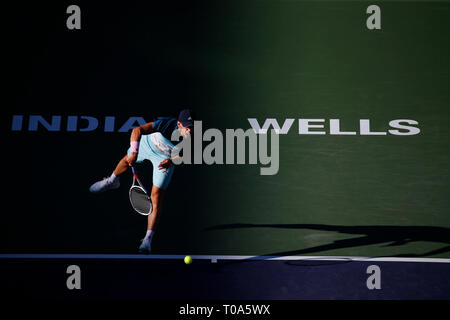 Dominic Thiem (AUT) serves against Roger Federer (SUI) during the men's ...
