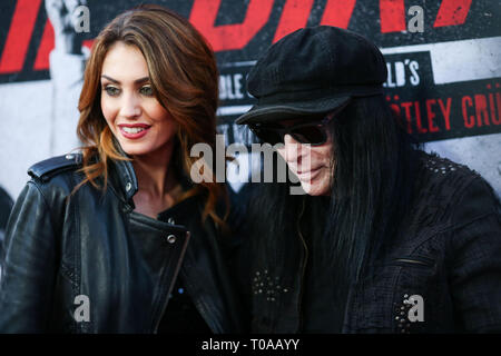 HOLLYWOOD, CA - MARCH 18: Seraina Schönenberger (L) and Mick Mars ...