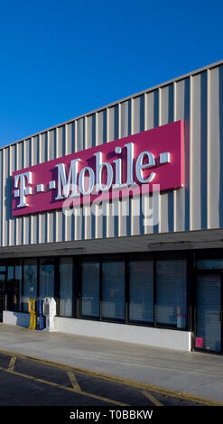 Tmobile T mobile phone retail outlet London UK with mobile phone user ...