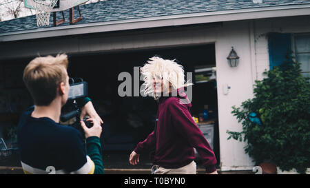 A crazy photo shoot with a funny model Stock Photo - Alamy