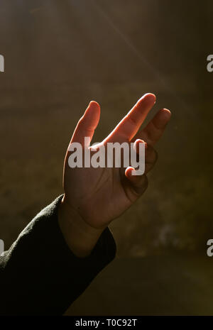 hand holding a Muslim rosary (sebha Stock Photo - Alamy