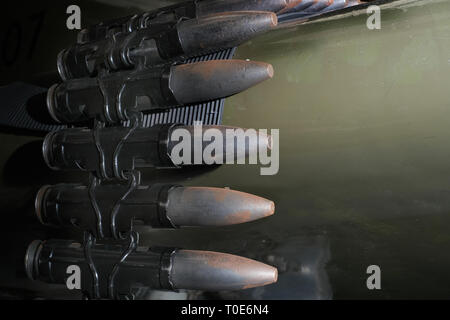 30 mm cannon shells in link ready to load into fast jet fighter ...