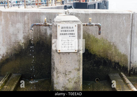 Public drinking water tap on street Stock Photo - Alamy
