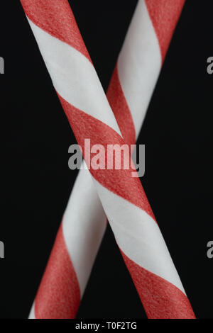 Red eco-friendly paper straw on light blue background Stock Photo - Alamy