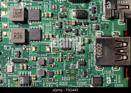 Closeup view at laptop motherboard and semiconductors components. Look ...