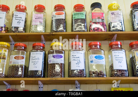 Various jars of sweets for sale in an old fashioned sweet shop ...