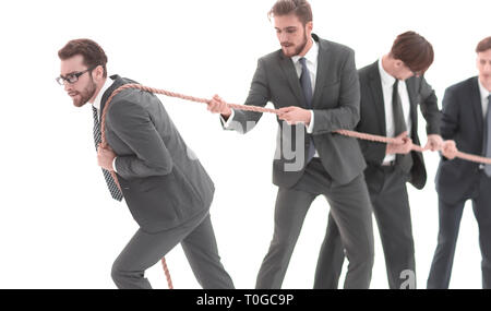 Leader Pulling Business Team While Playing Tug Of War Stock Photo - Alamy