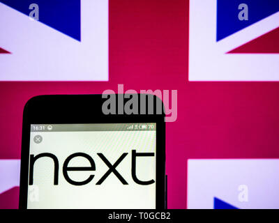 Next plc company logo seen displayed on smart phone Stock Photo - Alamy