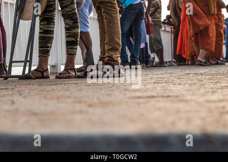 Crowd of people standing wearing sandals in Colombo, Sri Lanka Stock ...