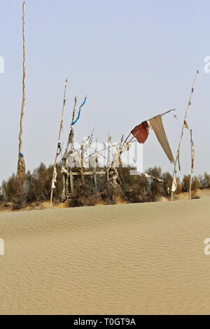 Votive flags-burial mound-Imam Asim's mazar or mausoleum area ...