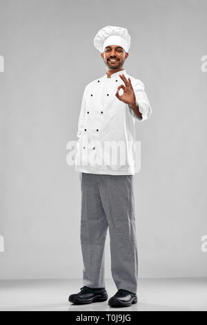 young asian chef with ok gesture Stock Photo - Alamy