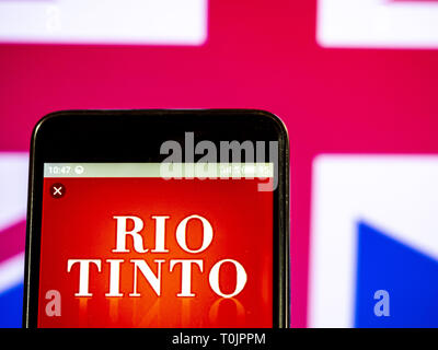 Rio Tinto plc company logo seen displayed on smart phone Stock Photo ...