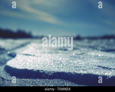 Snow shined with sun. Beautiful real snow background with snowflakes ...