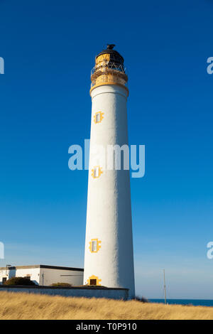 Barns Ness deactivated Stevenson lighthouse tower with clear blue sky ...