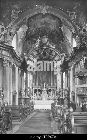 Interior view of the central nave, aisle section with soaring, gold ...