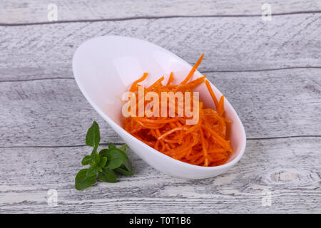 Korean cattot snack salad in the bowl served basil leaves Stock Photo ...