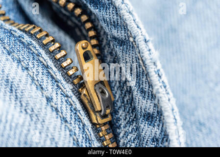 Extreme close-up of metal zipper. Macro photography, tailoring or ...