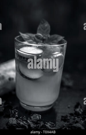 Three Lemons and Mint on a Rustic Wooden Background Stock Photo - Alamy