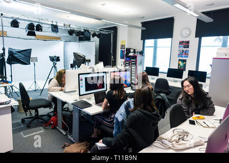 a media studies classroom full of students learning during a lesson ...