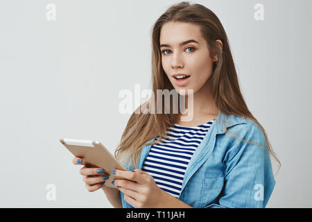 Waist-up portrait of confident sassy young attractive girl in glasses ...