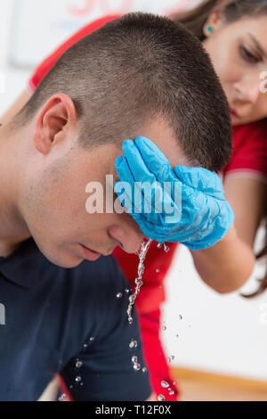 First Aid Training. Food Poisoning. First aid course Stock Photo - Alamy