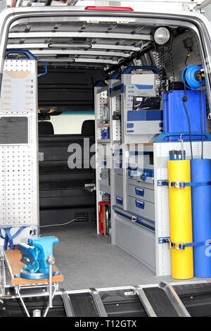 Interior of mobile service van with tools Stock Photo - Alamy