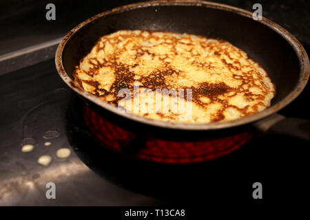 Real life pancake making in a kitchen in London, UK Stock Photo - Alamy