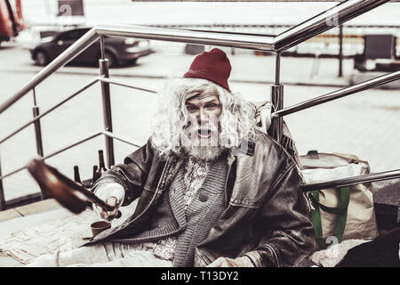Angry, Bearded Homeless Man Stock Photo - Alamy