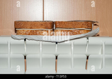 vegan cheese sandwich heating on top of the radiator Stock Photo - Alamy