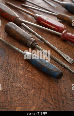 Old wooden handled woodworking tools with screwdrivers, mallet or ...