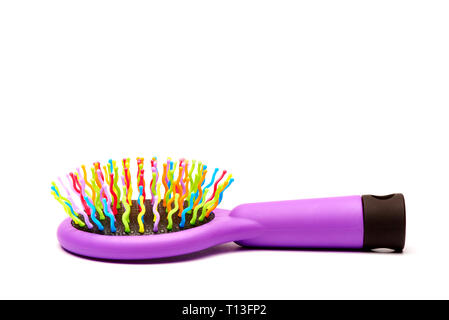 Bright multi-colored hair comb on a white background Stock Photo - Alamy