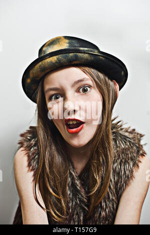 Portrait of a girl making a face Stock Photo - Alamy