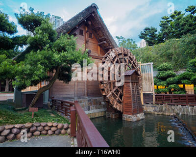 Old chinese water mill in the entrance of the Old Town of Lijiang ...