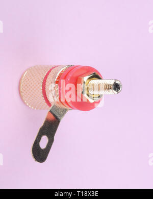 Speaker connector on pink background Stock Photo - Alamy