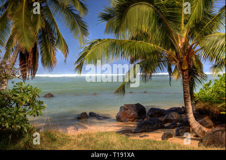 Amazing tropical island shore, two sun beds loungers, umbrella palm ...