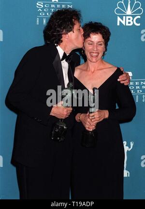 Geoffrey Rush of ?Shine? and Frances McDormand of ?Fargo? pose together ...
