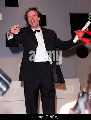 Italian actor and director Roberto Benigni walks the red carpet during ...