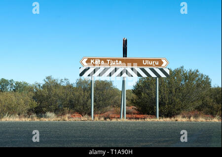 Lasseter Highway road sign directions to Stuart Highway and Uluru ...