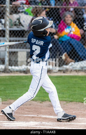 Little league baseball batter on deck Stock Photo - Alamy