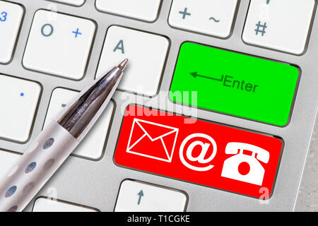contact us printed on computer keyboard Stock Photo - Alamy