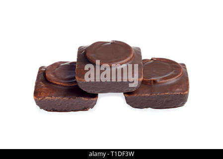 Small chocolate and vanilla layered cakes in rows on candy buffet ...