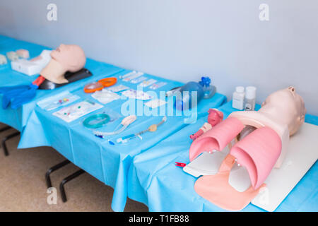 background medical mannequins, head for practice tracheotomy. Museum in ...