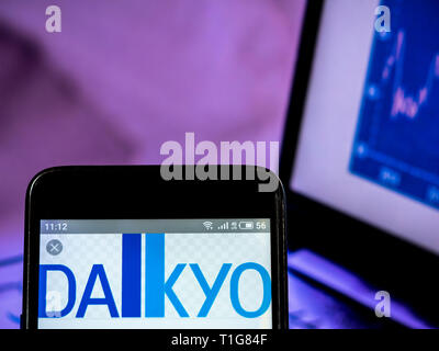 In this photo illustration a Daikyo Incorporated logo seen displayed on ...