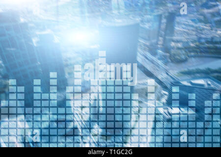 Financial chart on blurred skyscraper office background Stock Photo - Alamy