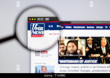 Fox News website homepage. Fox News channel logo visible through a ...