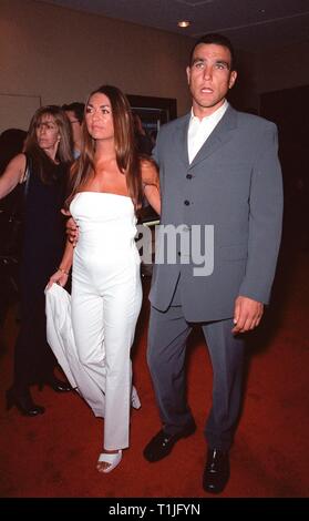 Footballer turned Actor Vinnie Jones poses with his gun during the ...