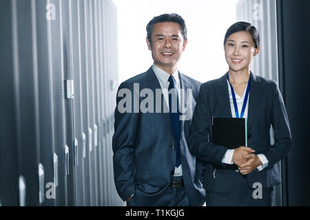 Technical personnel in machine room inspection Stock Photo - Alamy