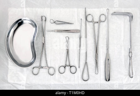 Gynecological sterile tools. A lot of instruments of gynecologist on ...